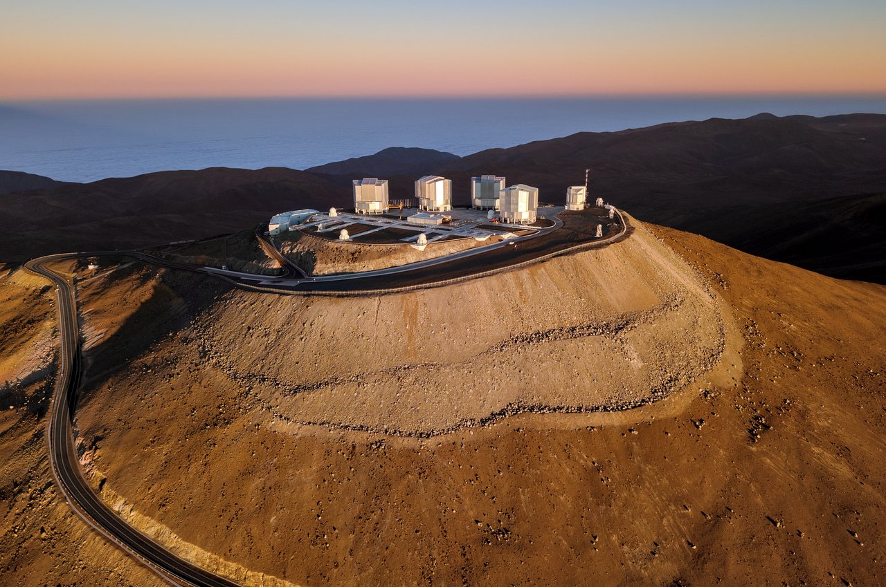 The sea behind a shadowy VLT | ESO Australia